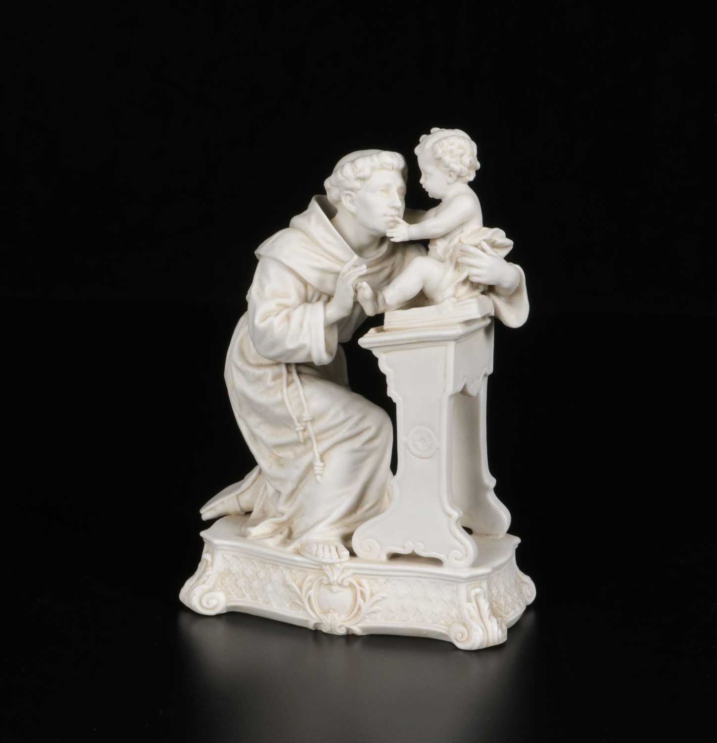 Lot 63 - Biscuit Porcelain Figure of Saint Anthony of